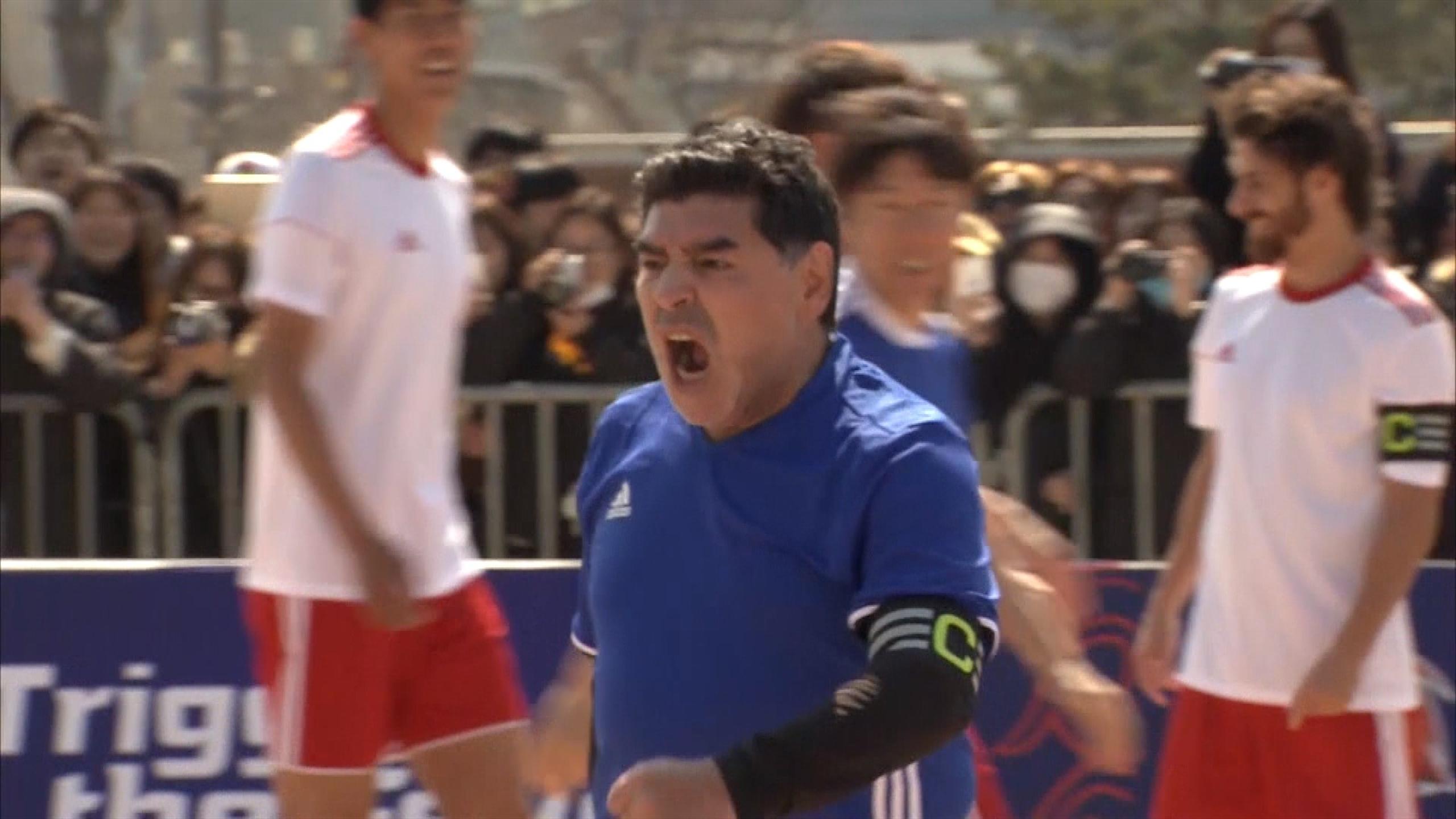 Diego Maradona booked for recreating Hand of God moment - Football ...