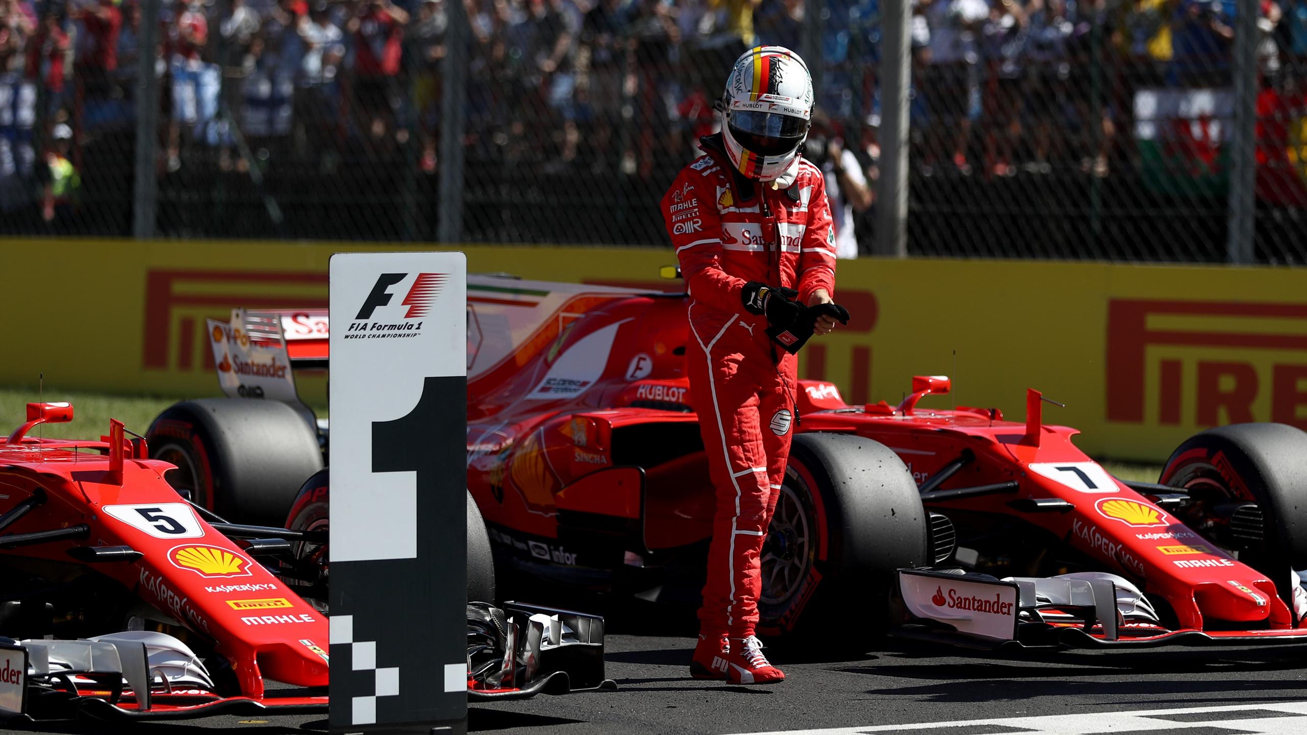 Sebastian Vettel (Ferrari) en pole position devant Kimi Räikkönen ...