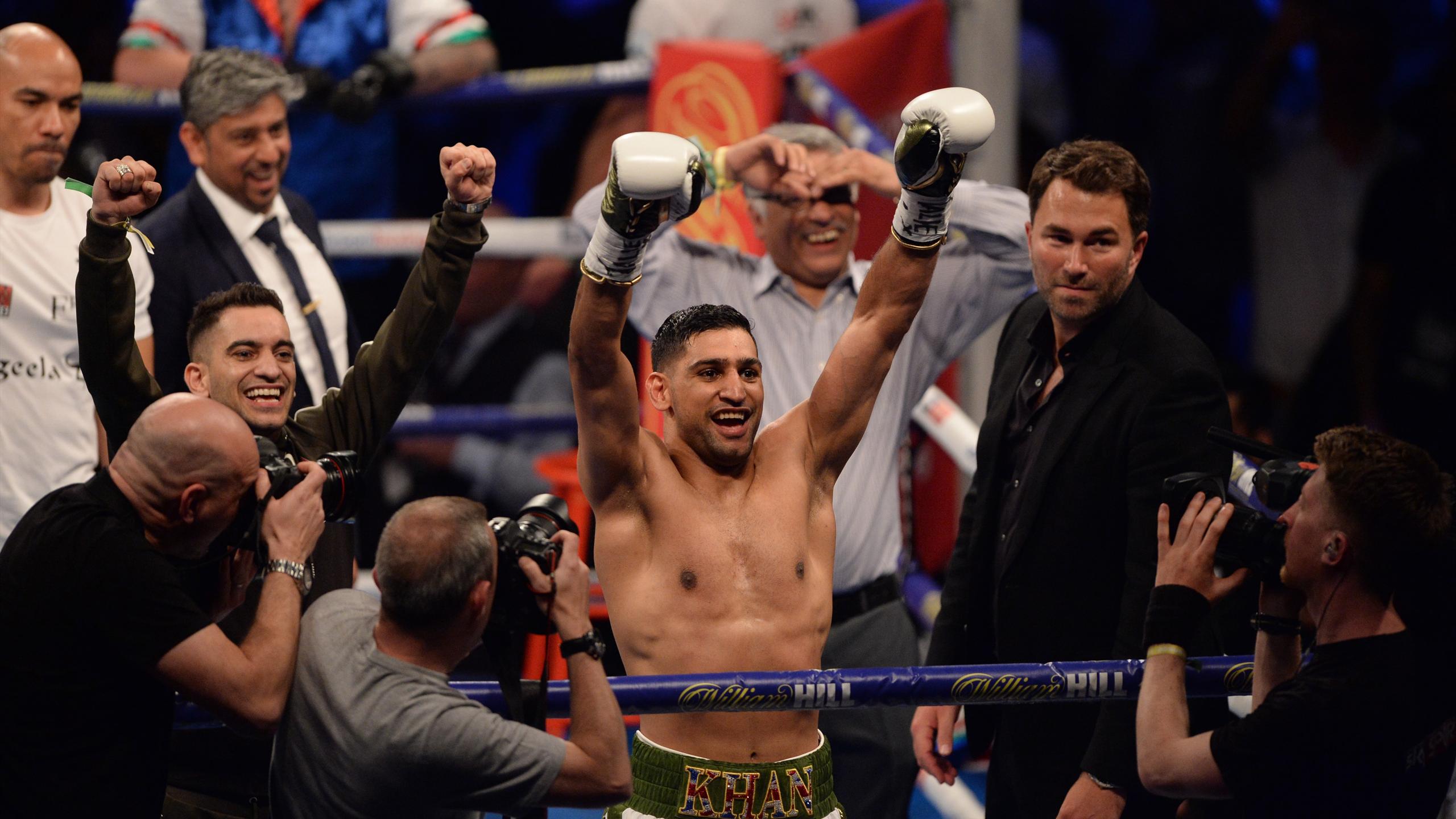 Amir Khan makes emphatic return to the ring with first round stoppage ...