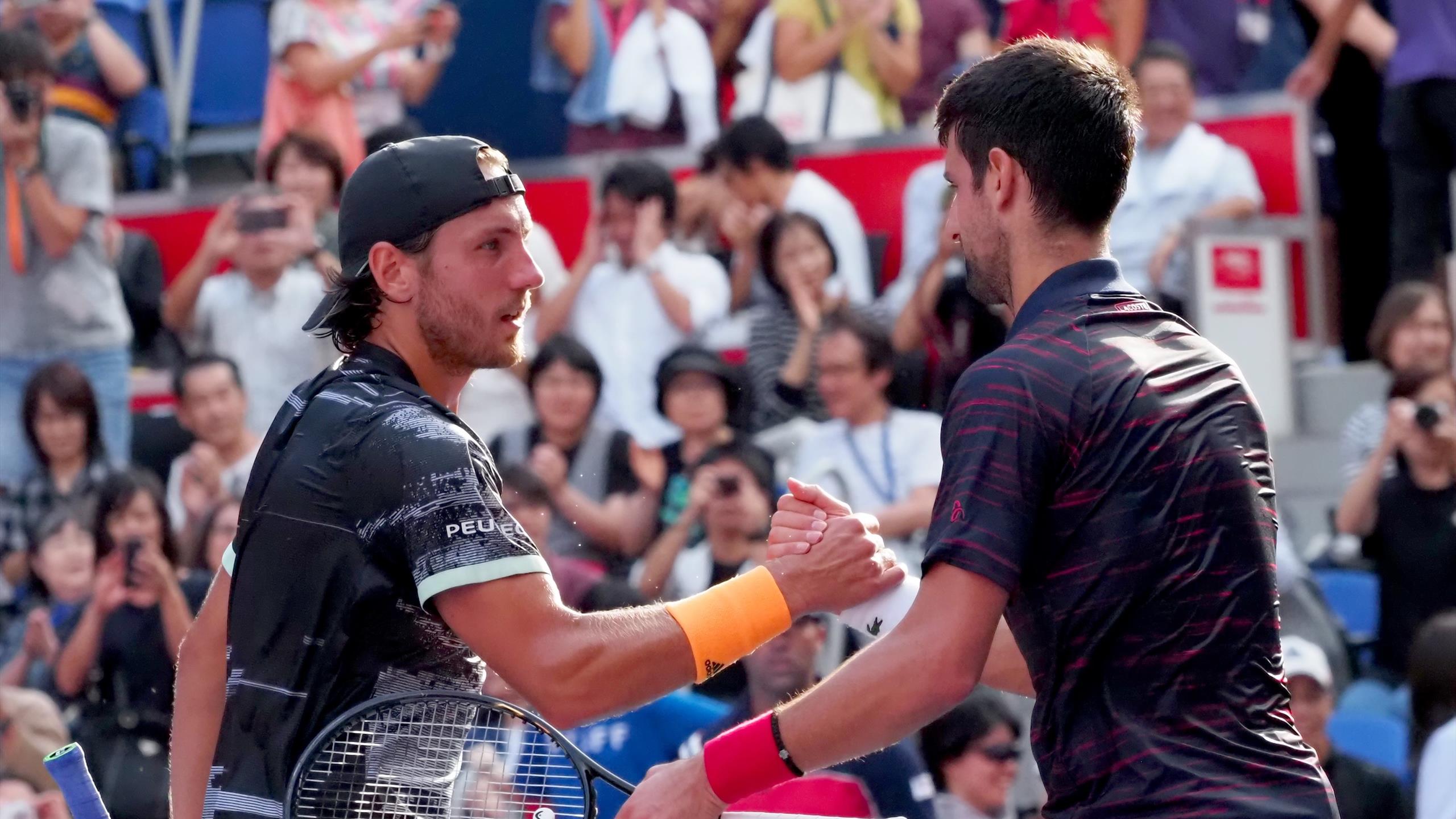 ATP Tokyo - Djokovic s'impose facilement face à Pouille et file en demi ...