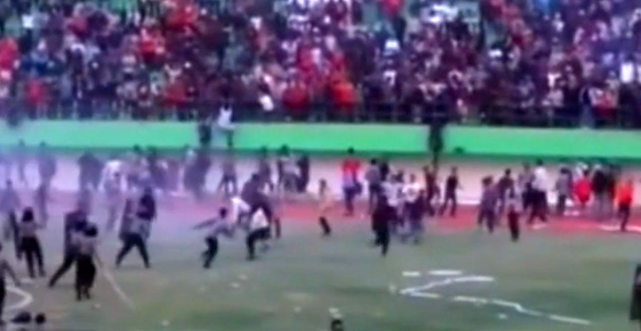Fan left dead and 12 more injured after huge riot following 1-1 draw ...
